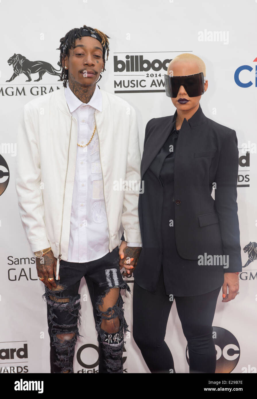 Rapper Wiz Khalifa (L) and model Amber Rose attend the 2014 Billboard ...