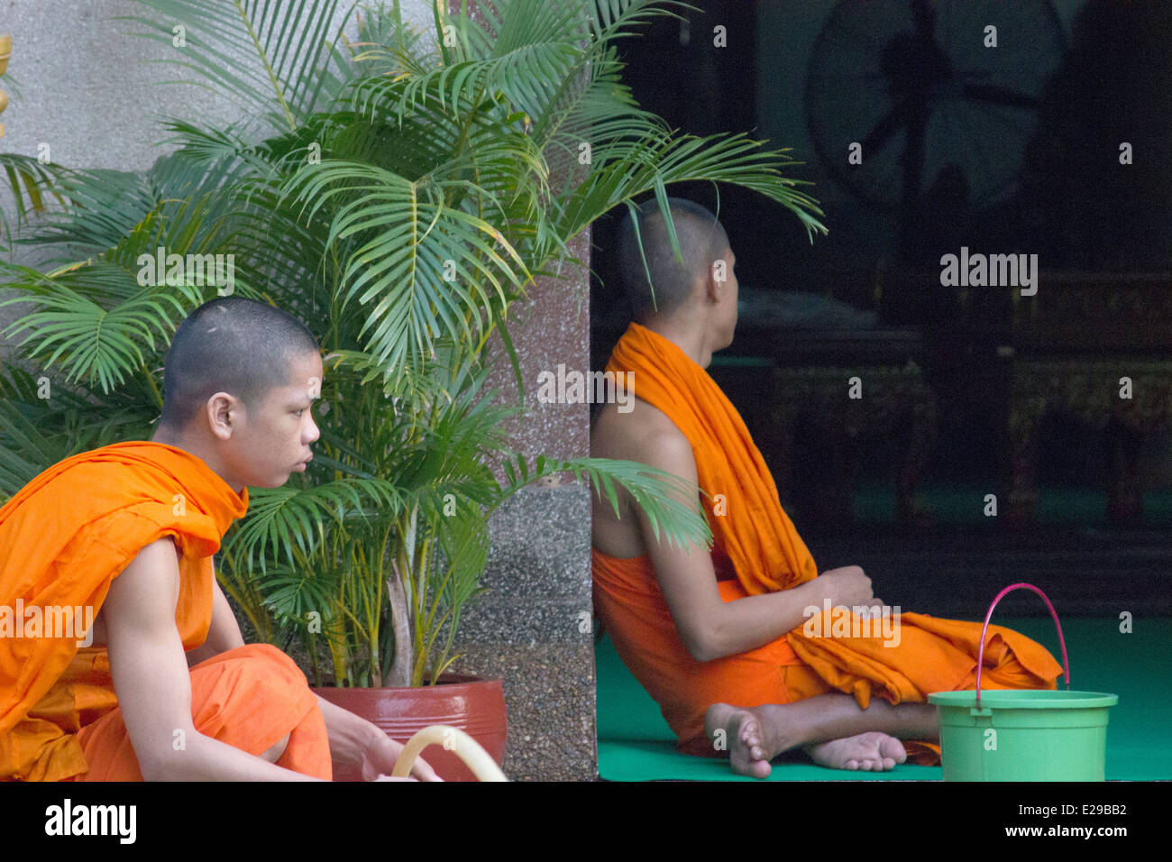Monks relaxing outside a temple in Phnom Penh, Cambodia Stock Photo - Alamy