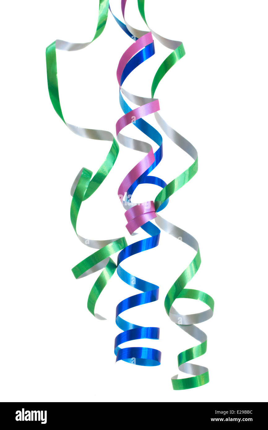 Multicolored curling stream paper strands Stock Photo - Alamy