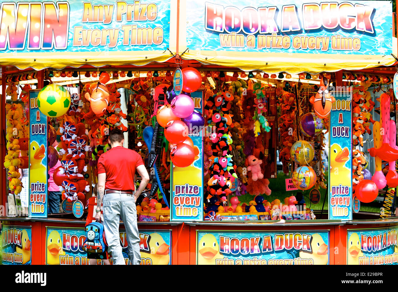 Vibrant vivid colourful Hook a duck fairground stall at Autokarna 2014 ...