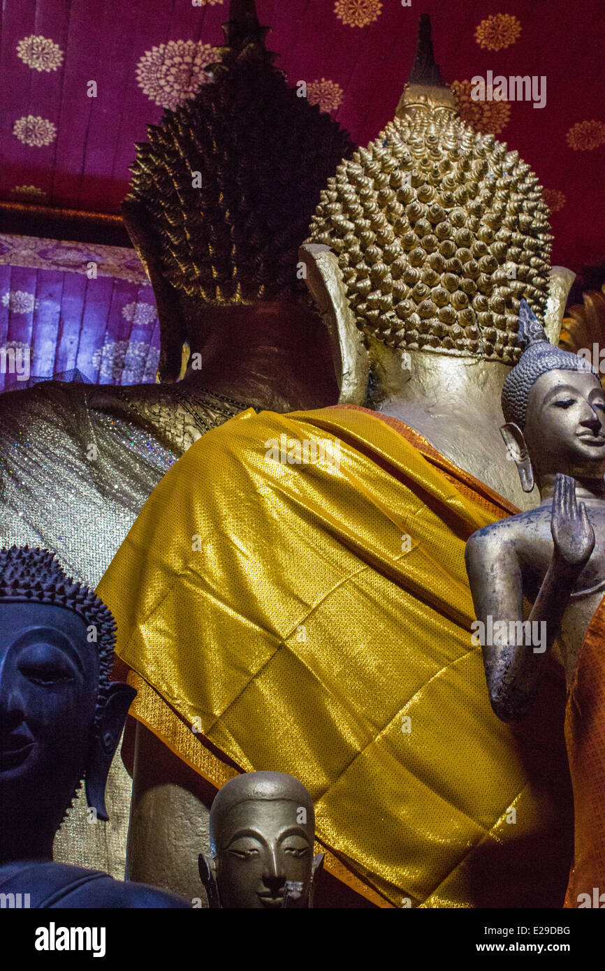 Buddhas in a temple in the ancient town of Luang Prabang, situated in ...