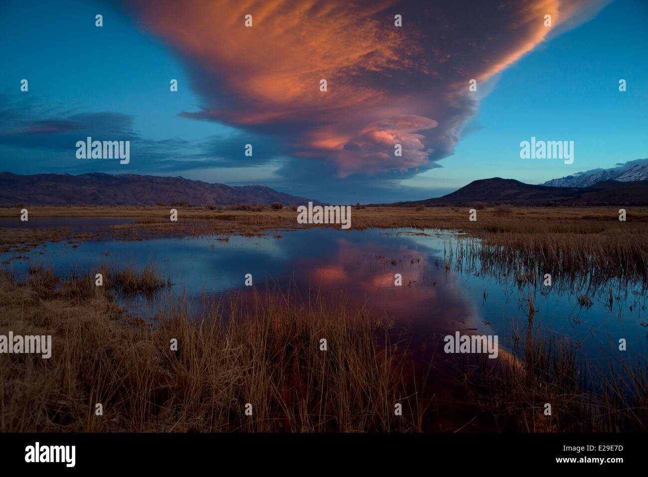 Lenticular Cloud reflection in the Sierra Nevada Mountains Stock Photo ...