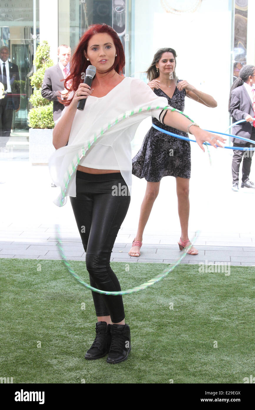 London, UK. 17th June, 2014. Amy Childs Hula Hoops as she launches 'Big ...