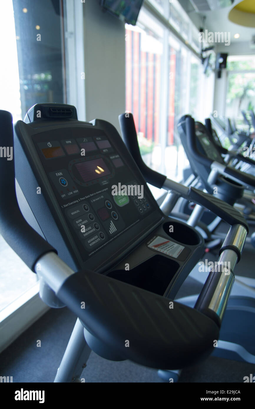 Bicycles in a gym Stock Photo - Alamy