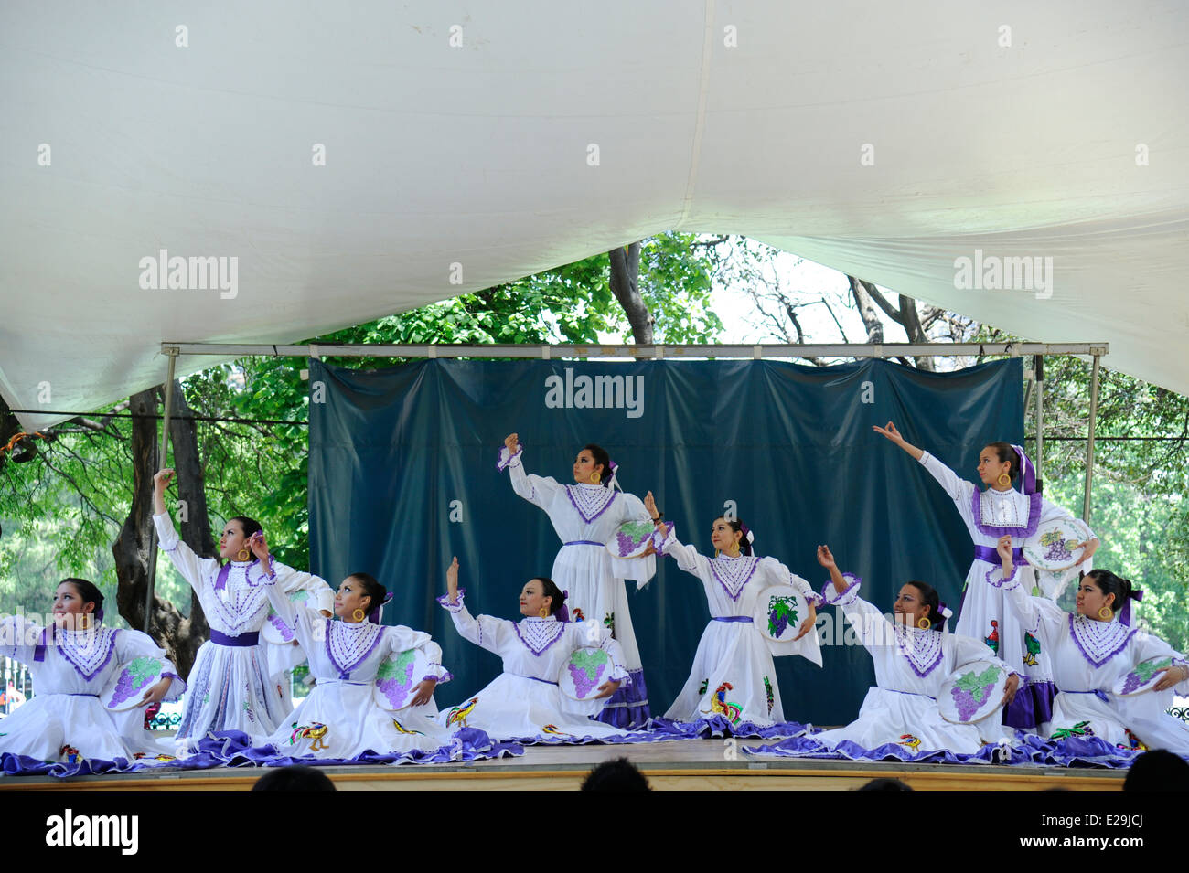 High school dance class exhibition of traditional Mexican dances in ...