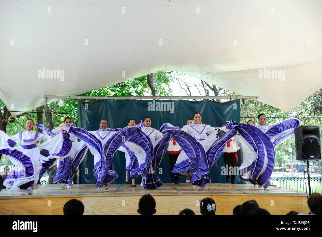 High school dance class exhibition of traditional Mexican dances in ...