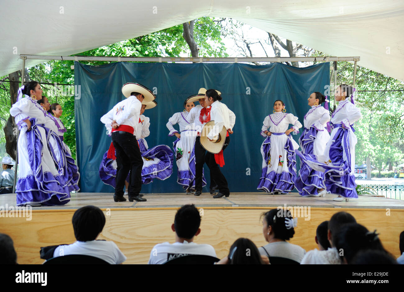 High school dance class exhibition of traditional Mexican dances in ...