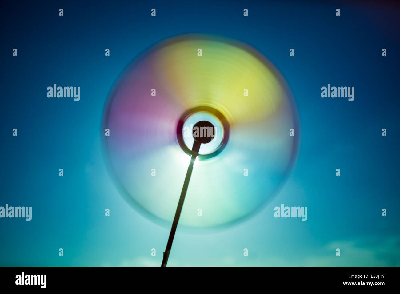 A toy windmill spinning Stock Photo - Alamy