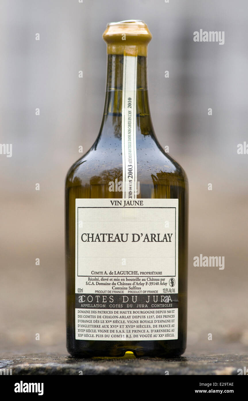 France, Jura, Arlay, castle of Arlay, yellow wine bottle named clavelin ...