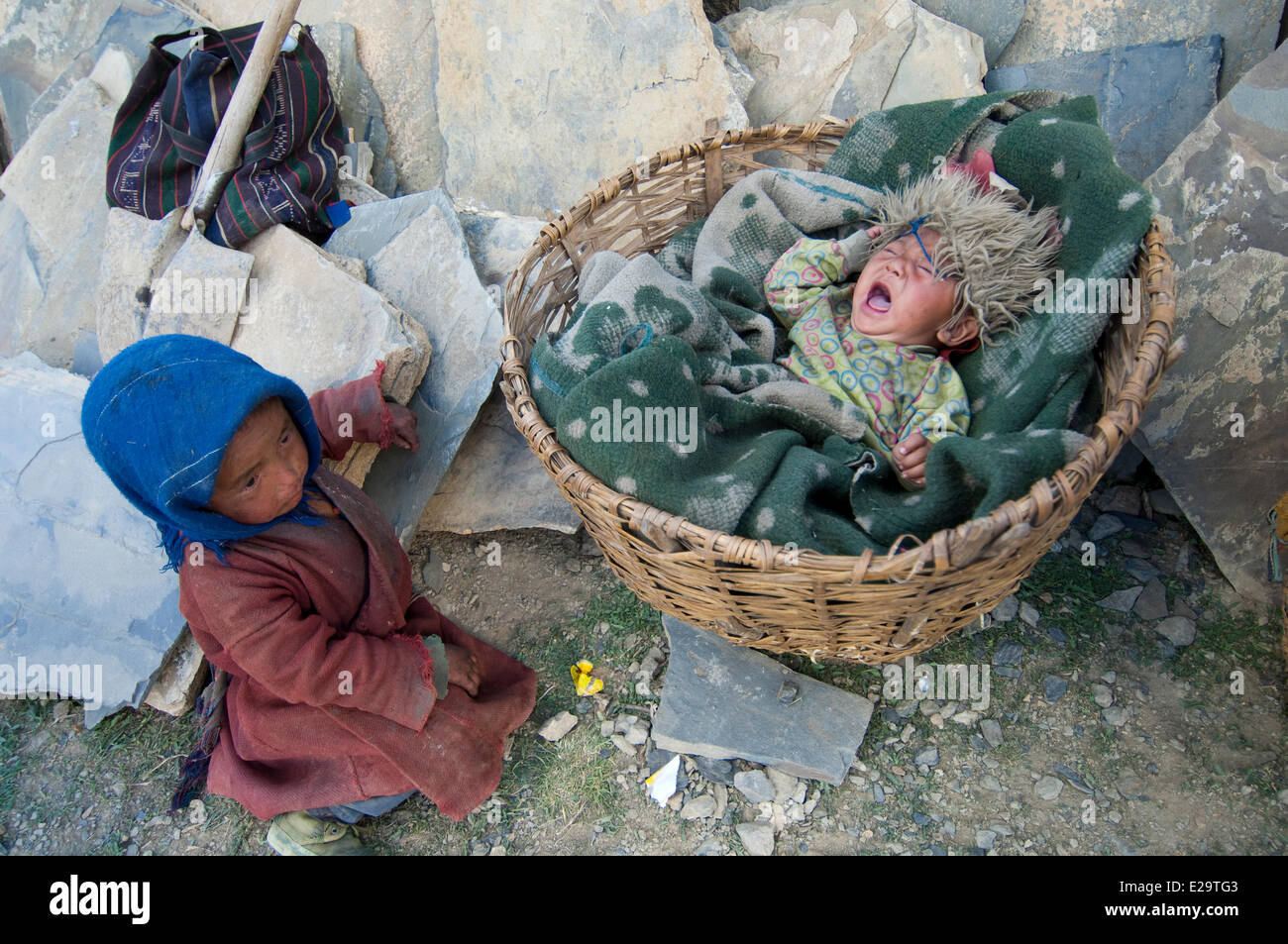 Nepal, Karnali Zone, Dolpo Region, Saldang, baby crying in his craddle ...