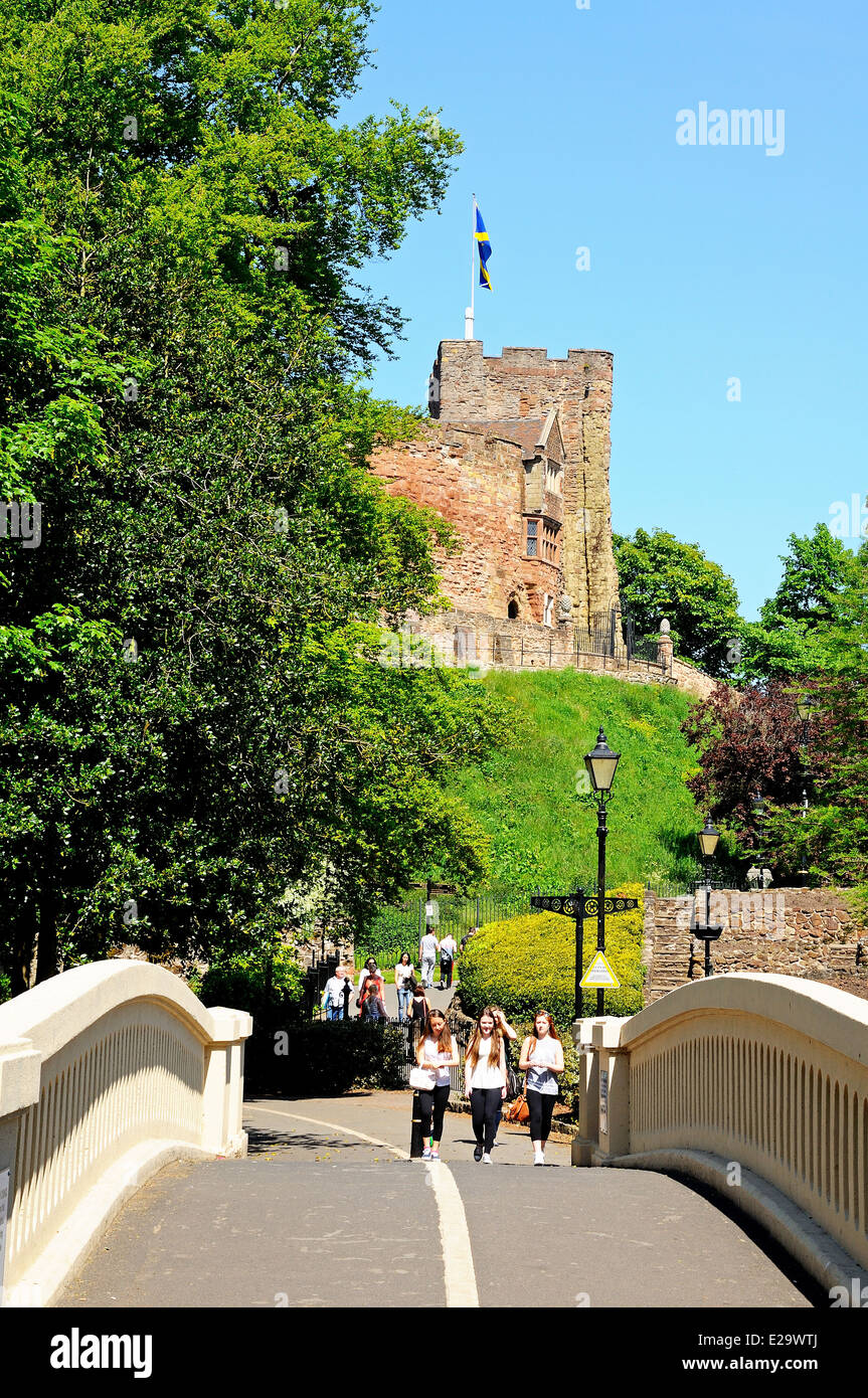Footbridge over the River Anker with the Norman castle to the rear ...