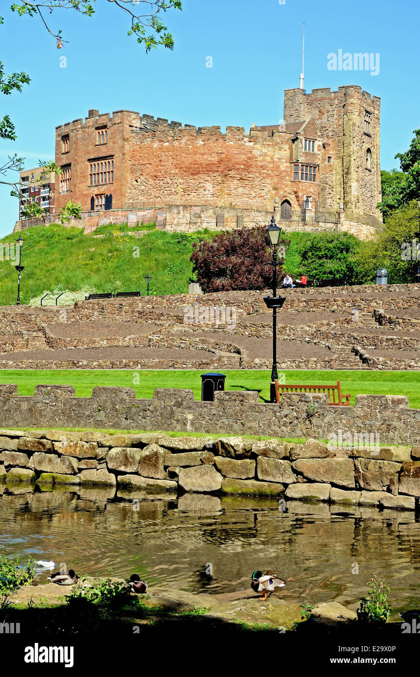 View of the Norman castle and gardens with the River Anker in the ...