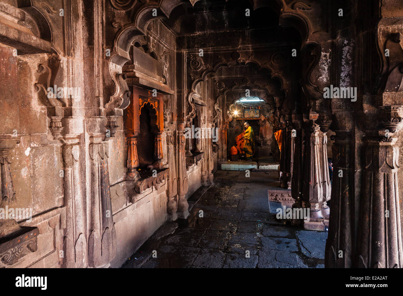 India, Maharashtra state, Trimbak, woman making offerings to Ganesh in ...