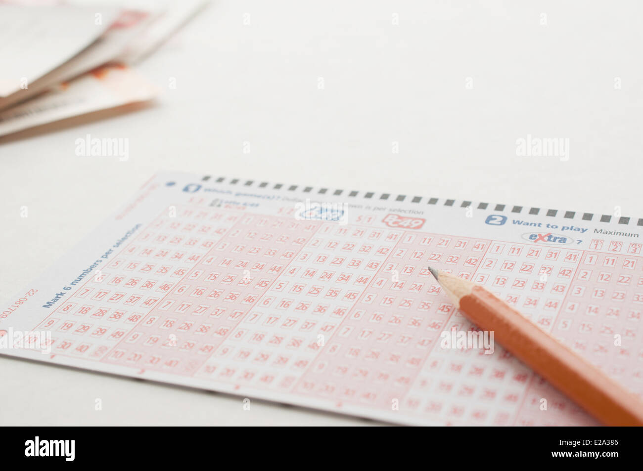 Close up pen on lottery ticket Stock Photo - Alamy