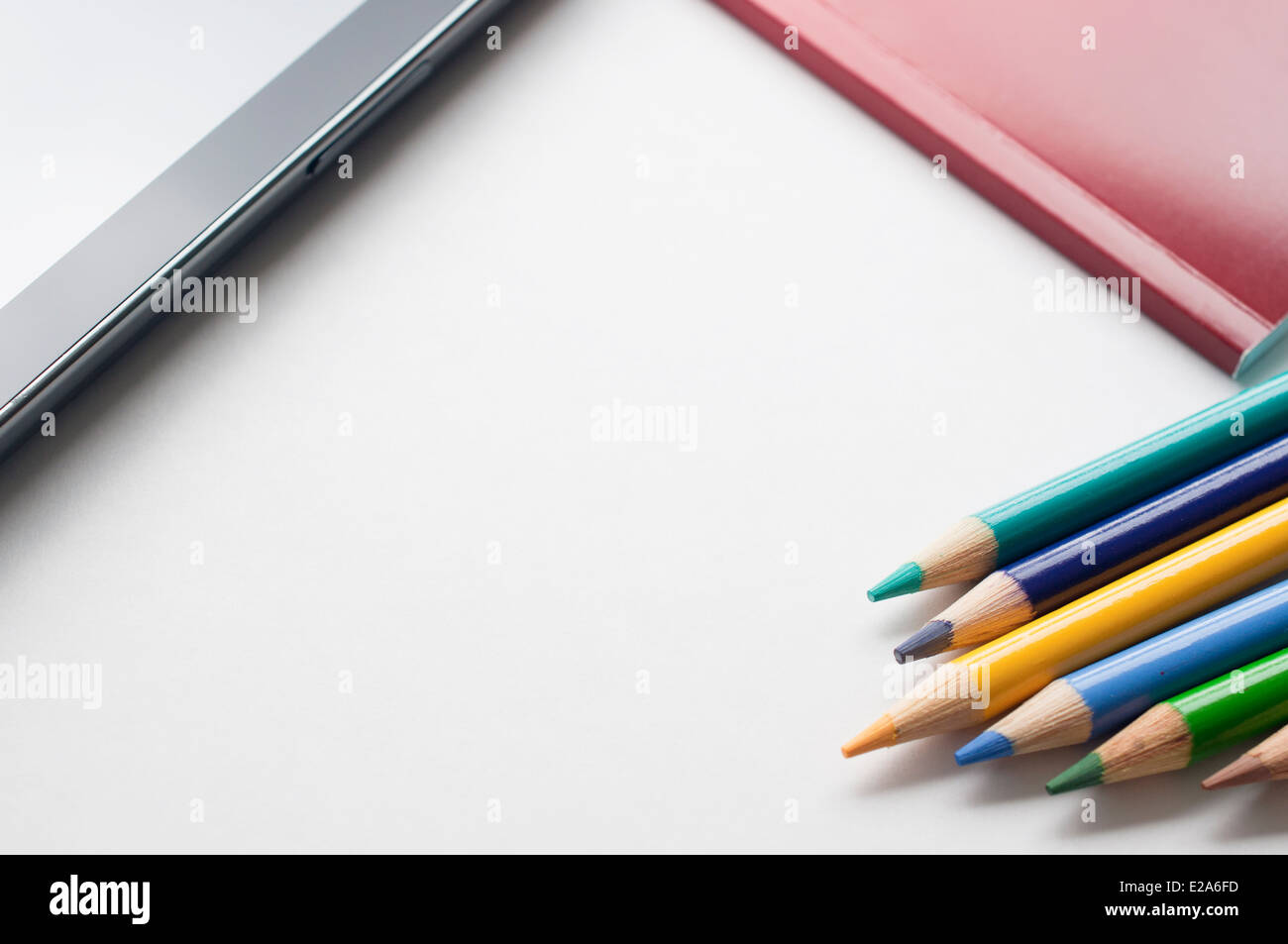 Tablet pc, notebook and pen Stock Photo - Alamy