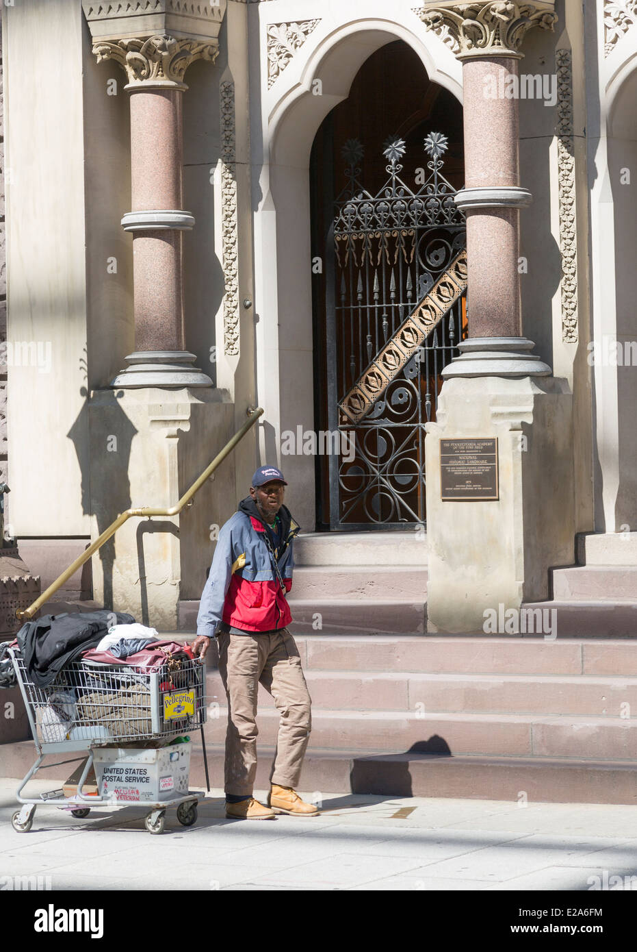 homeless man pulling trolley with belongings, Philadelphia ...