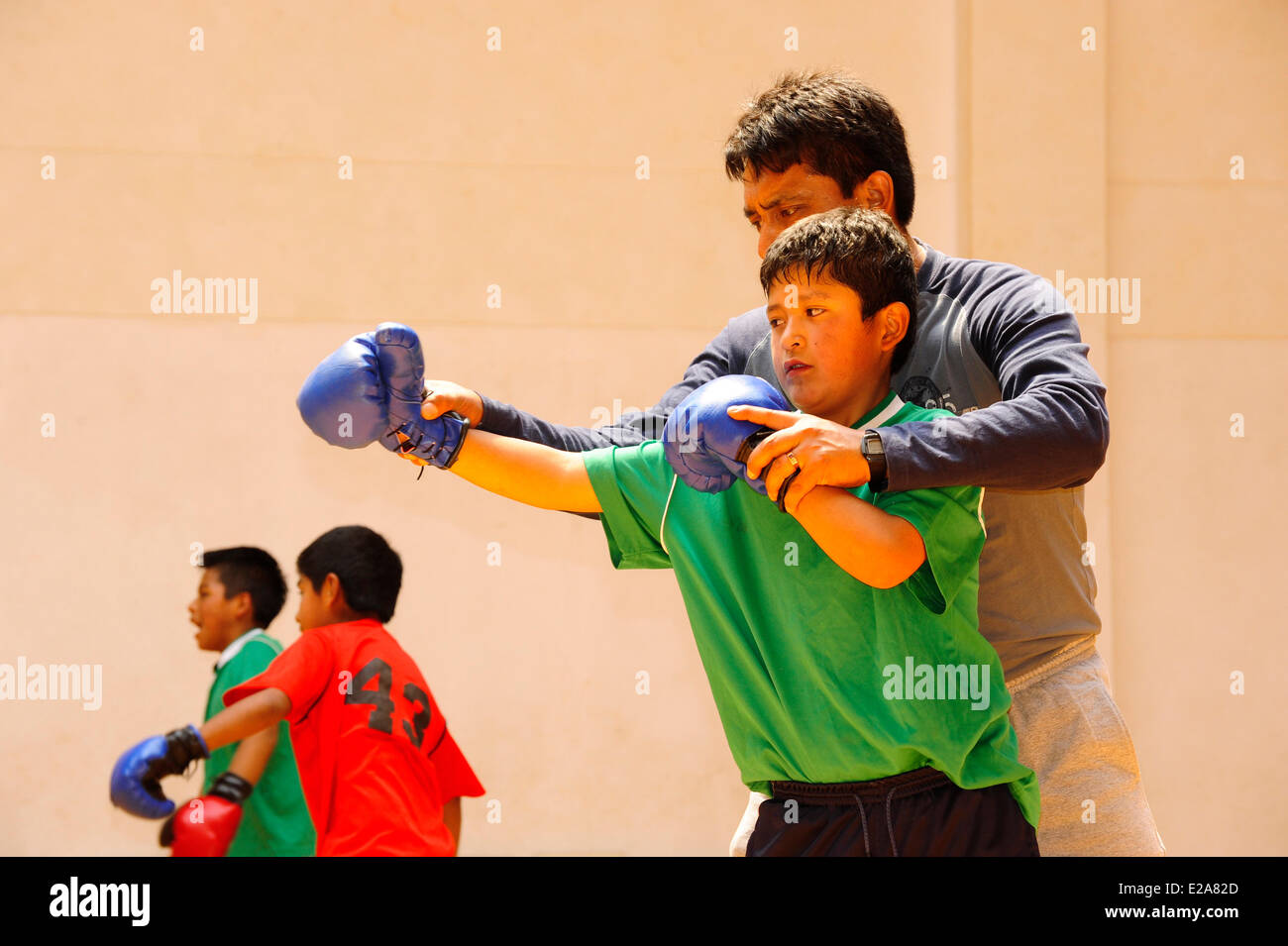 Peru, Cuzco Province, Cuzco, boxing session in the gymnasium of one of ...