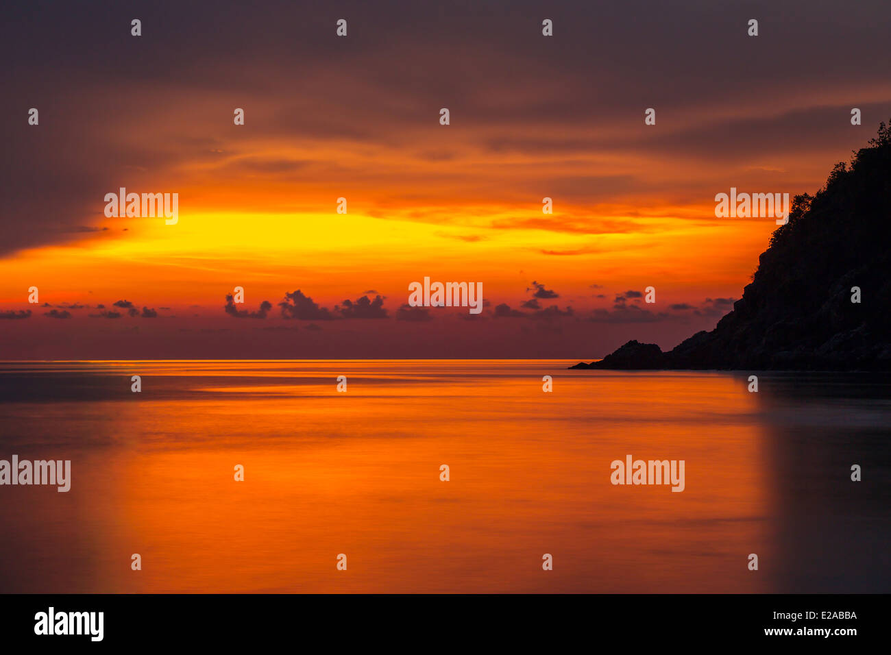 Dramatic red sunset sky over the ocean Stock Photo - Alamy