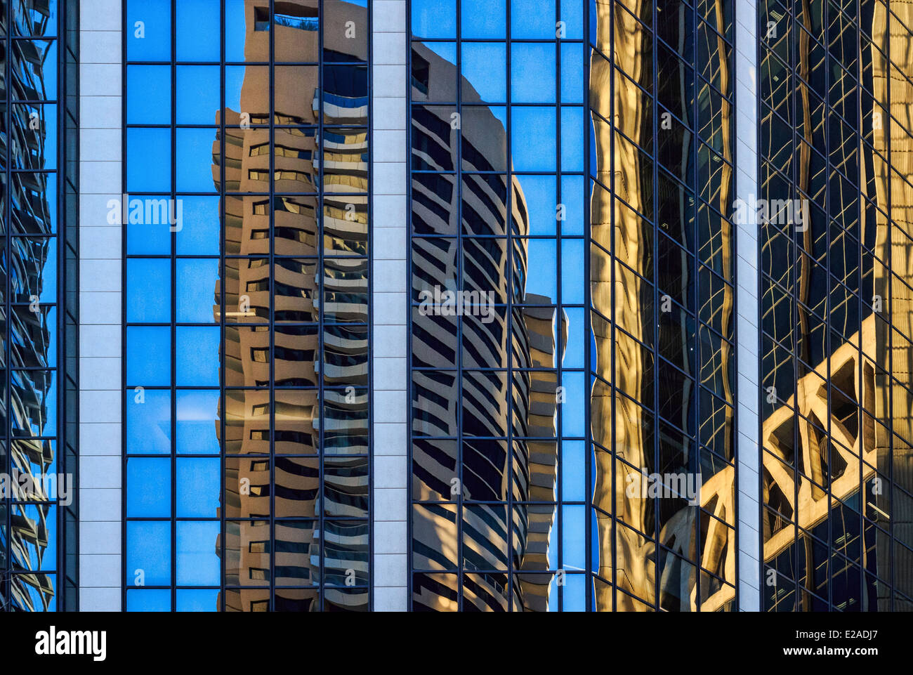 Skyscraper reflections in windows of high-rise buildings in Sydney ...