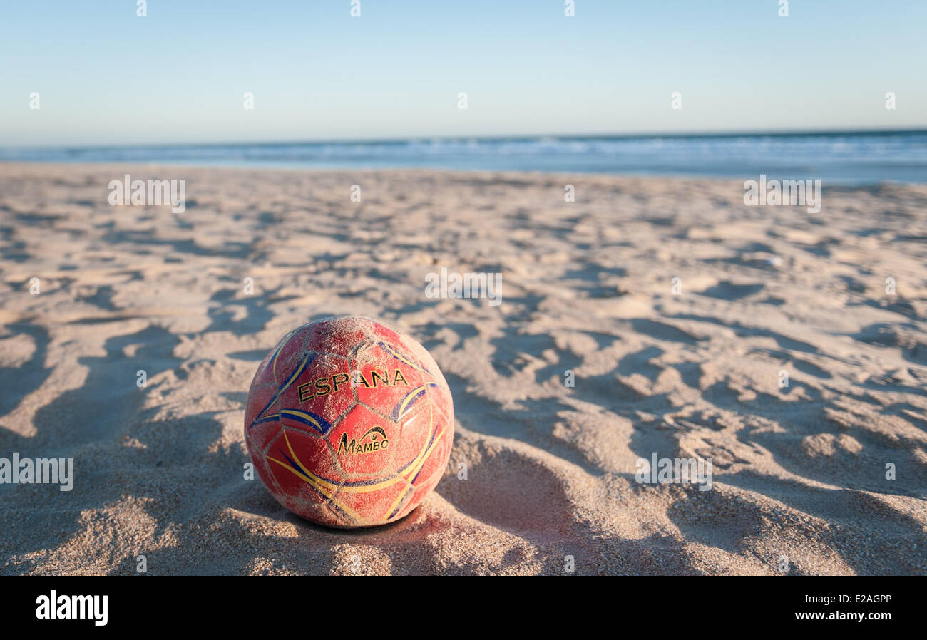 Football on the beach Stock Photo - Alamy