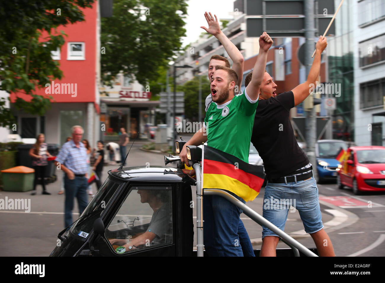German soccer fans celebrates in Waiblingen, Germany, June 16, 2014 ...