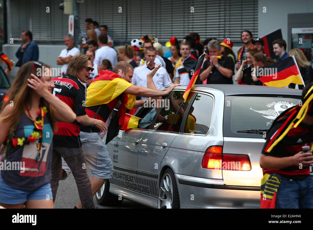 German soccer fans celebrates in Waiblingen, Germany, June 16, 2014 ...