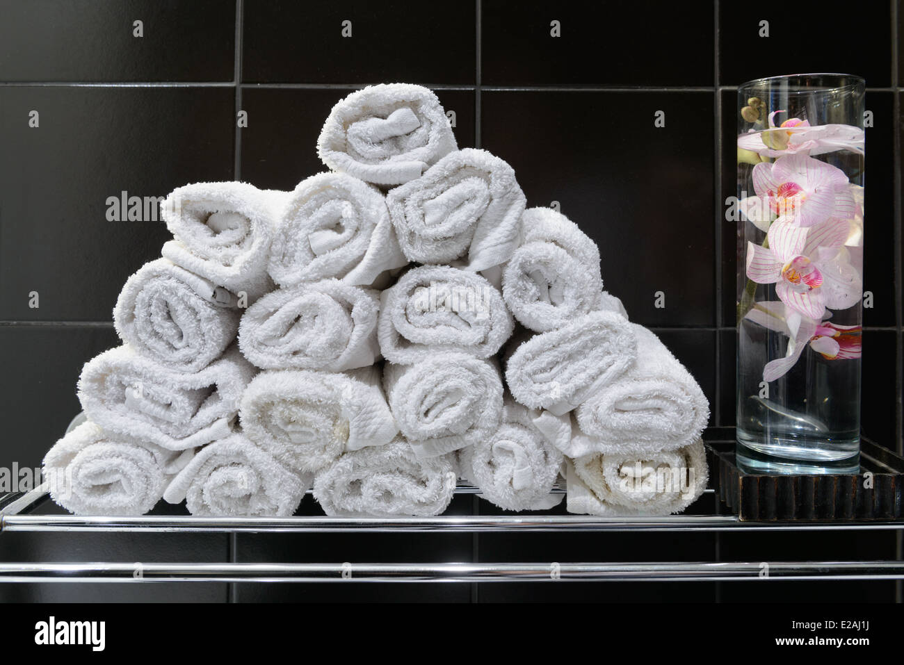 Stack of rolled up bathroom towels Stock Photo - Alamy