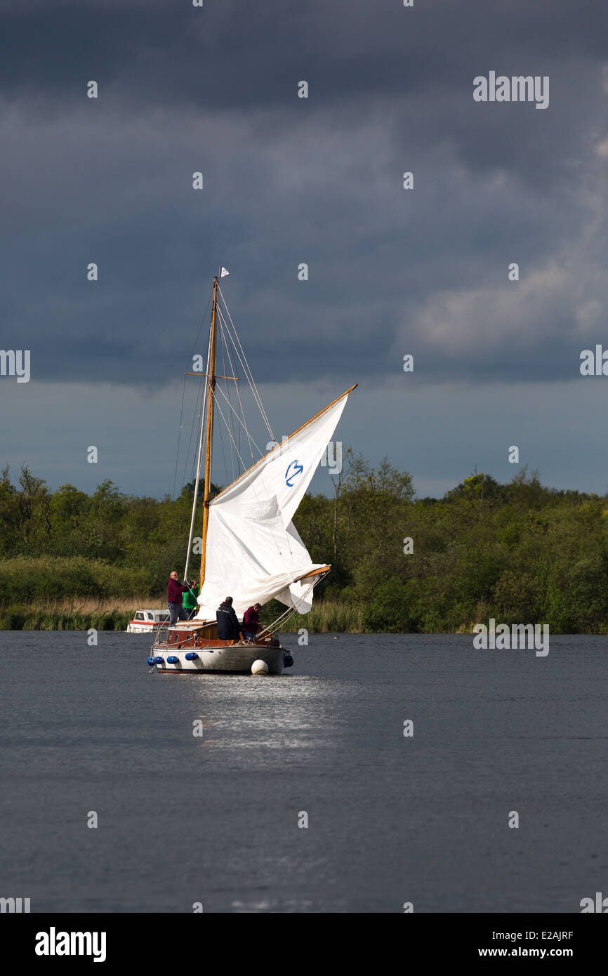 raising sails on yacht. Ranworth broad. Norfolk Broads England UK Stock ...