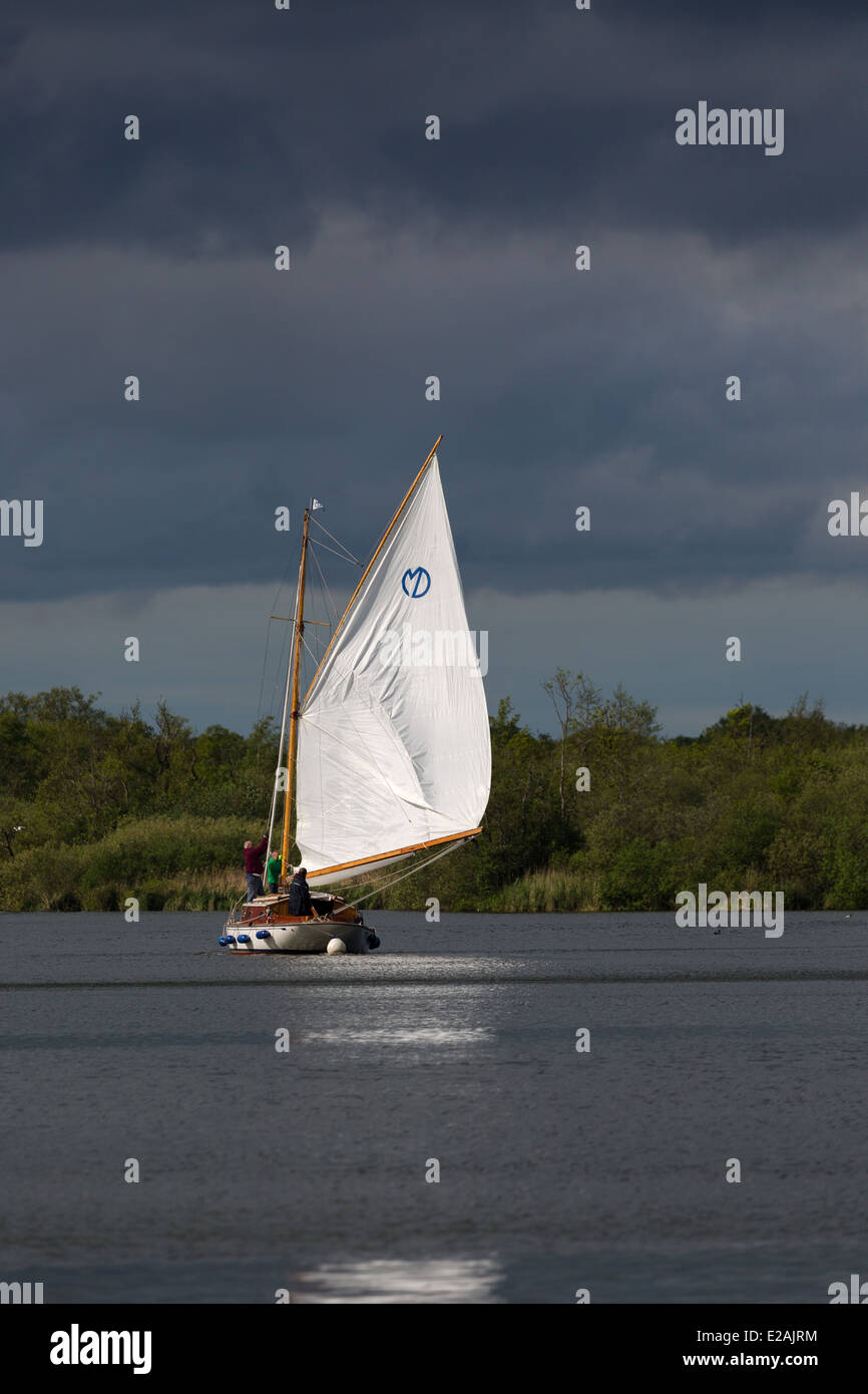 raising sails on yacht. Ranworth broad. Norfolk Broads England UK Stock ...