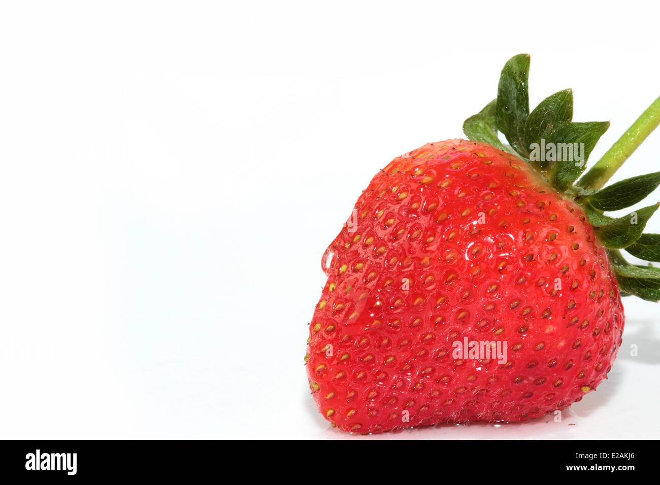 Strawberry isolated on a white background Stock Photo - Alamy