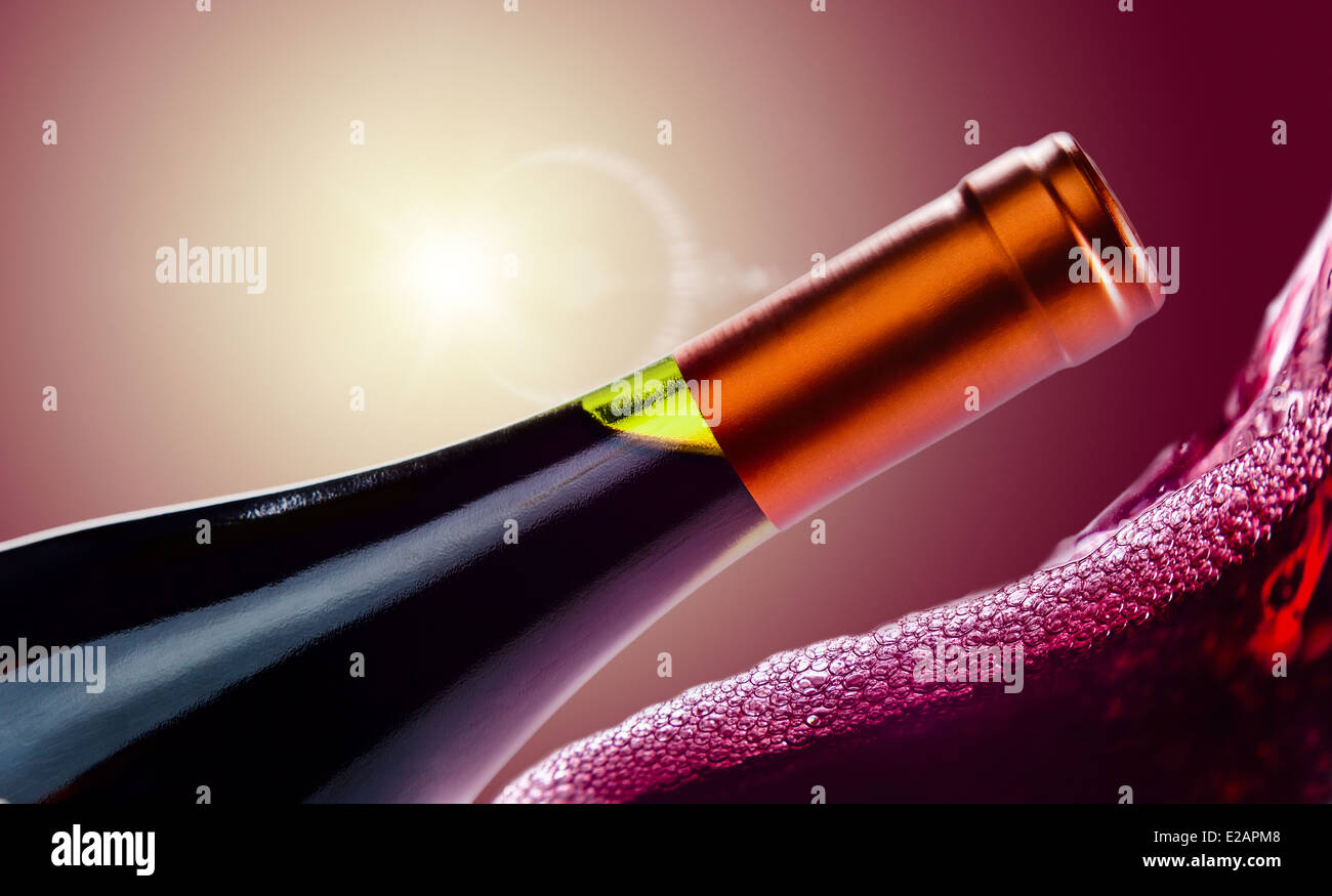 red wine , focus on a bottle Stock Photo - Alamy