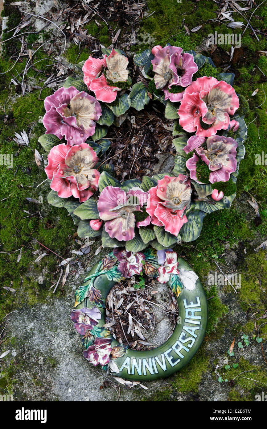 France, Paris, Pere Lachaise cemetery, ceramic funeral garland on a ...
