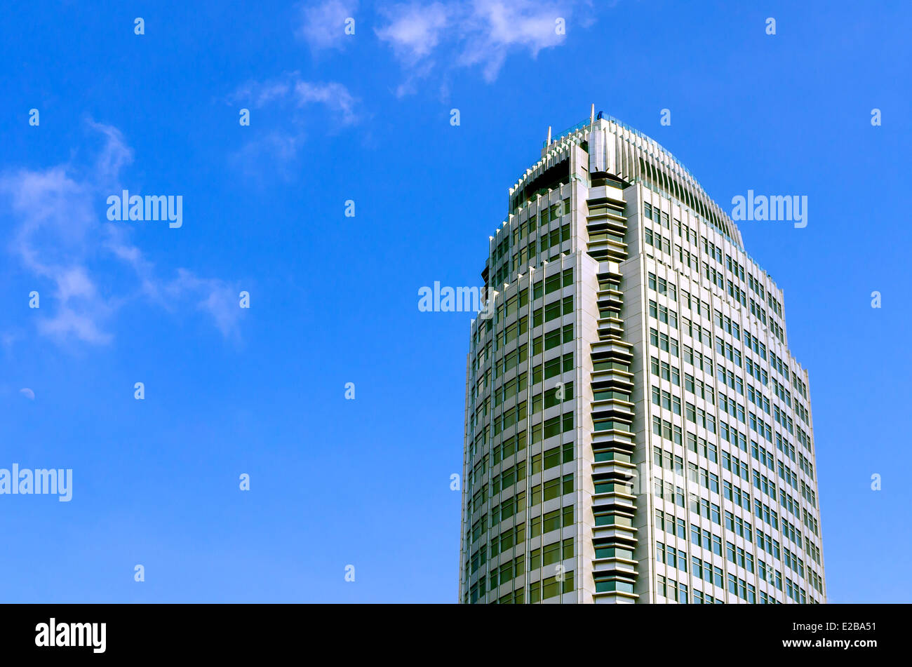 Building on blue sky background Stock Photo - Alamy
