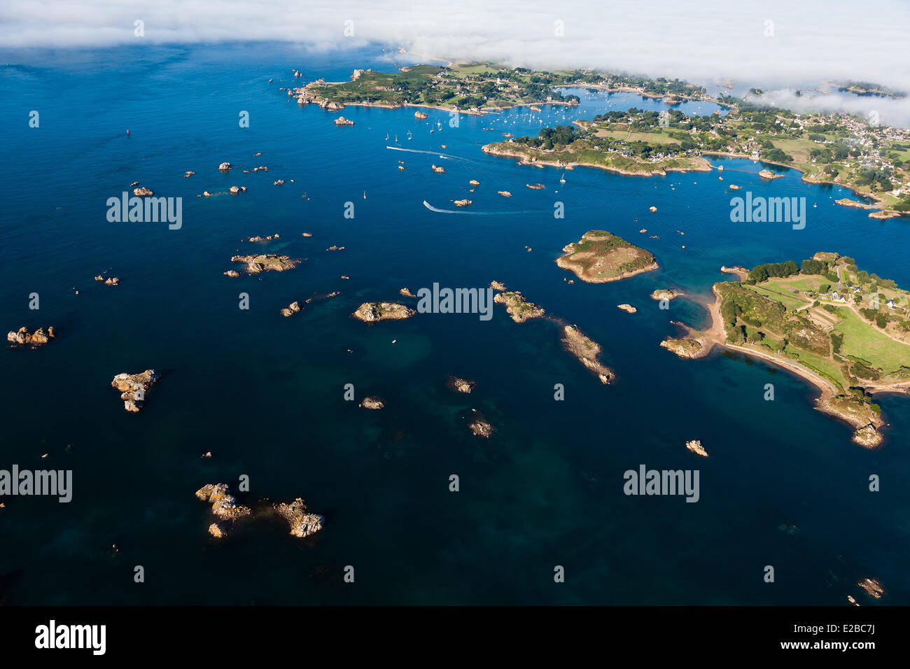 France, Cotes d'Armor, Ile de Brehat, sea mist on Brehat (aerial view ...
