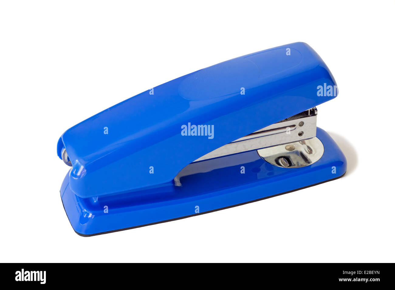 The bright blue stapler for papers, is photographed by a close up Stock ...