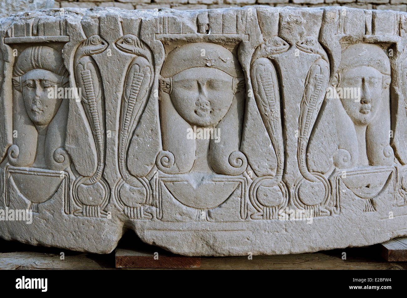 Egypt Dendera Hathor temple:stone head of the goddess in the courtyard ...