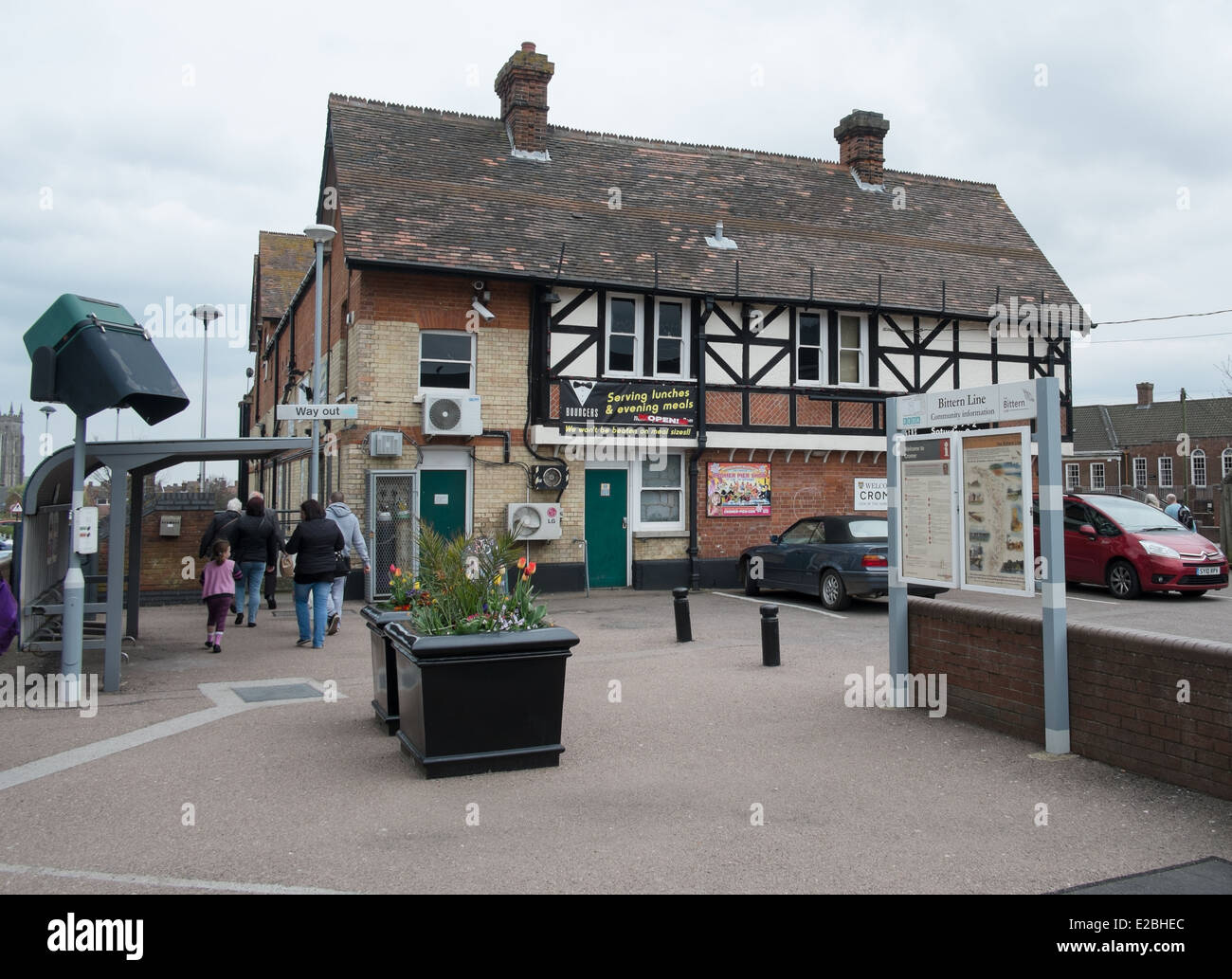 Cromer Railway Station signs and bus shelter Stock Photo - Alamy
