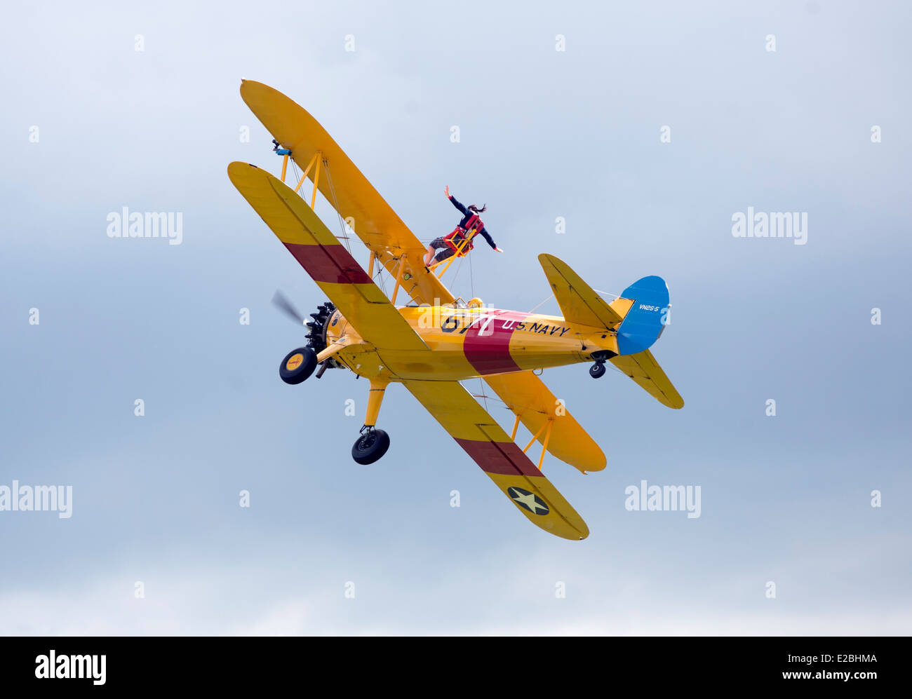 Woman wing walking on biplane on experience day Stock Photo - Alamy