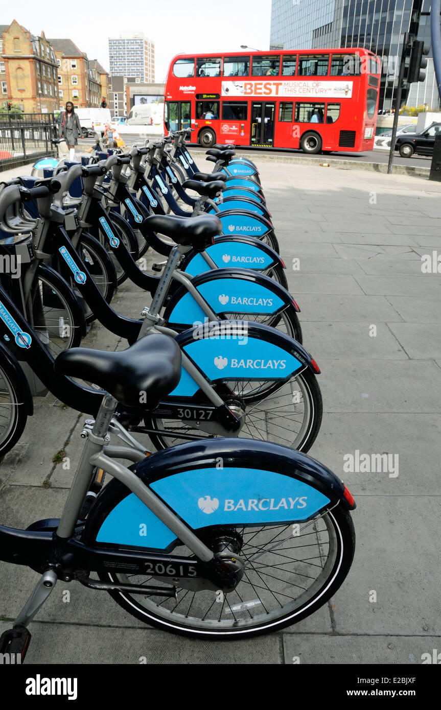 Barclays cycle Hire or Boris Bikes Bicycle with passing bus, Old Street Roundabout, London ...
