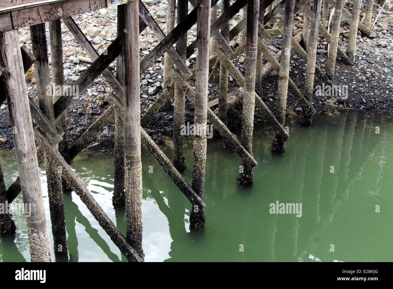 Wood dock pier saltwater in Juneau Alaska Stock Photo - Alamy