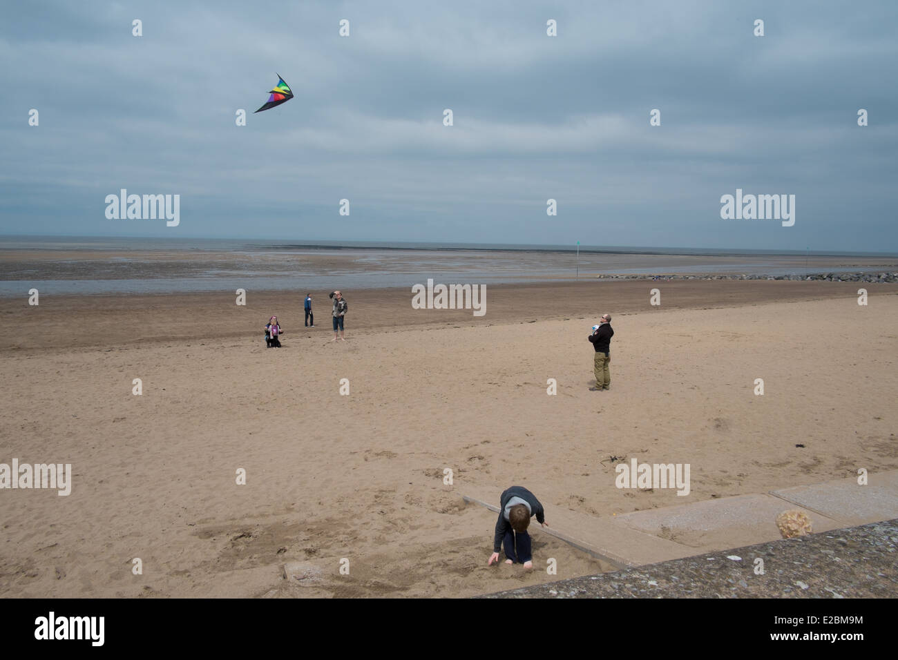 Kite flying on the beach Stock Photo - Alamy