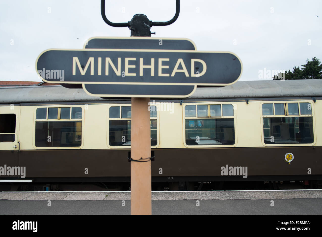 Minehead station sign and coach Stock Photo - Alamy