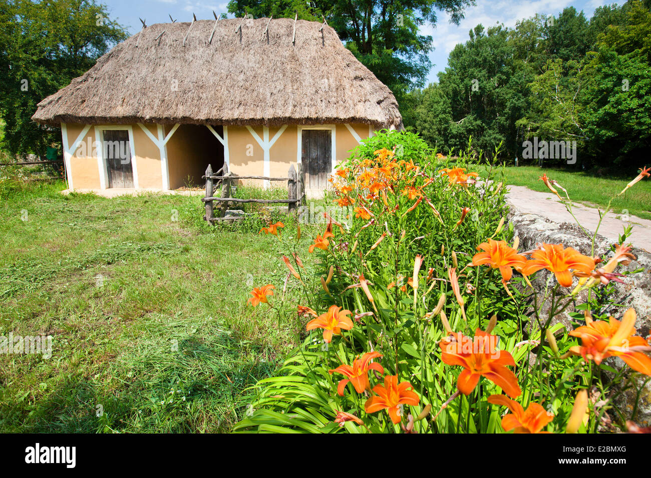 Ancient traditional ukrainian rural cottage with a straw roof near Kiev ...