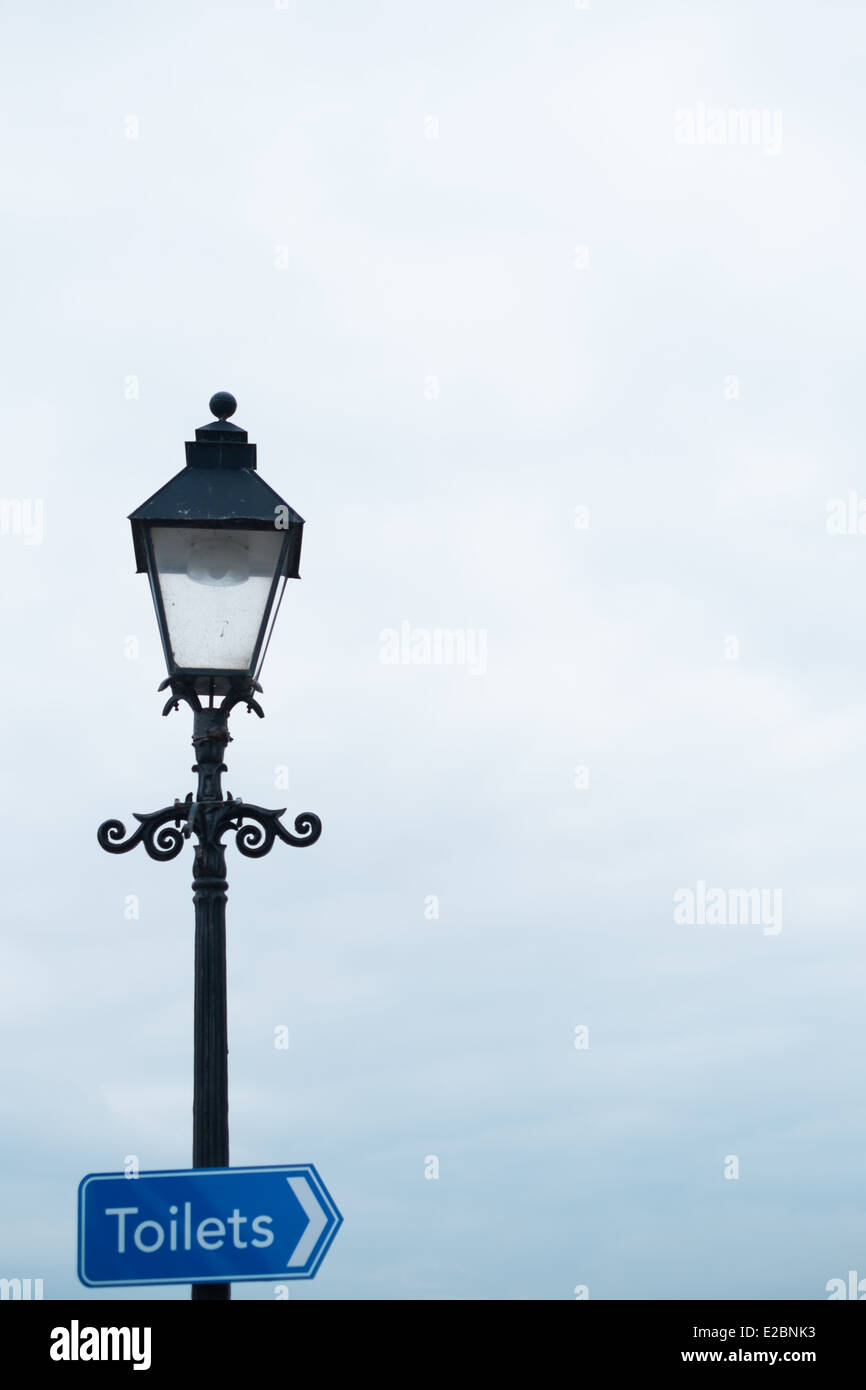 map post and toilet sign Stock Photo - Alamy
