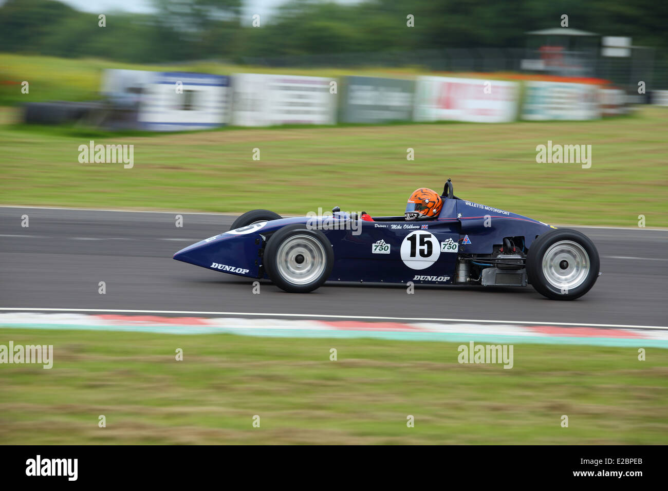 Cars racing at Castle Combe Circuit Stock Photo - Alamy