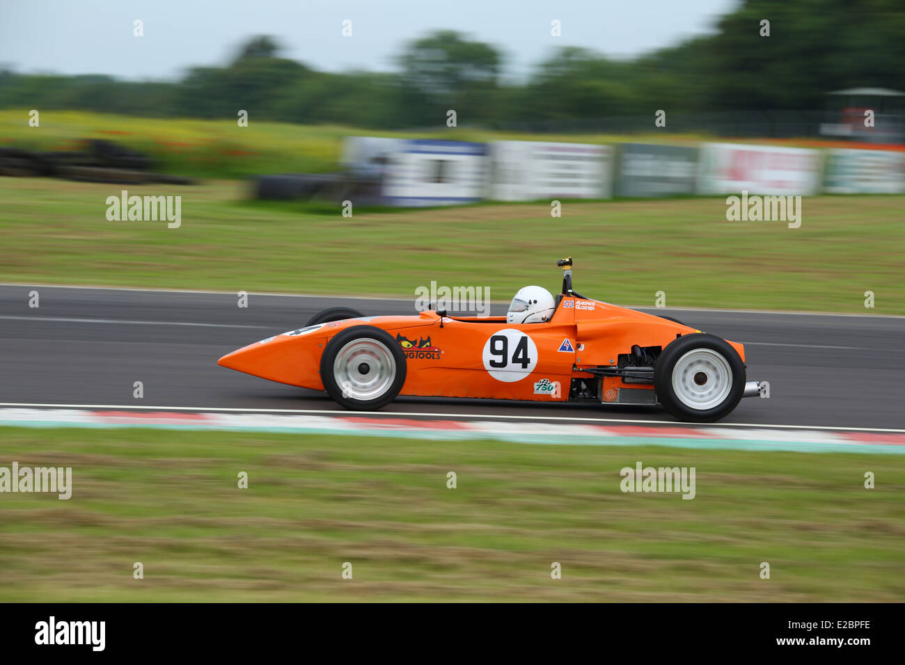 Cars racing at Castle Combe Circuit Stock Photo - Alamy