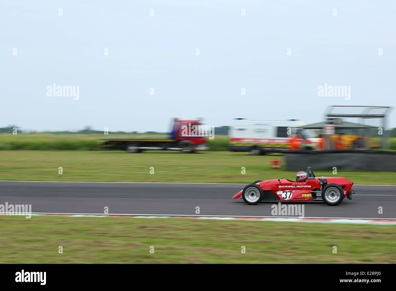 Cars racing at Castle Combe Circuit Stock Photo - Alamy