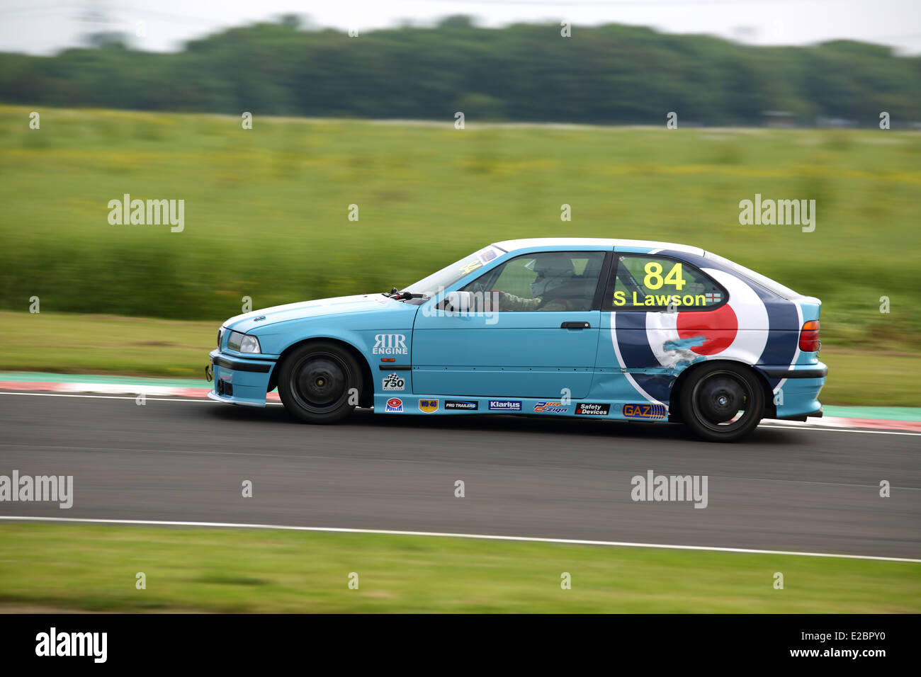 Cars racing at Castle Combe Circuit Stock Photo - Alamy