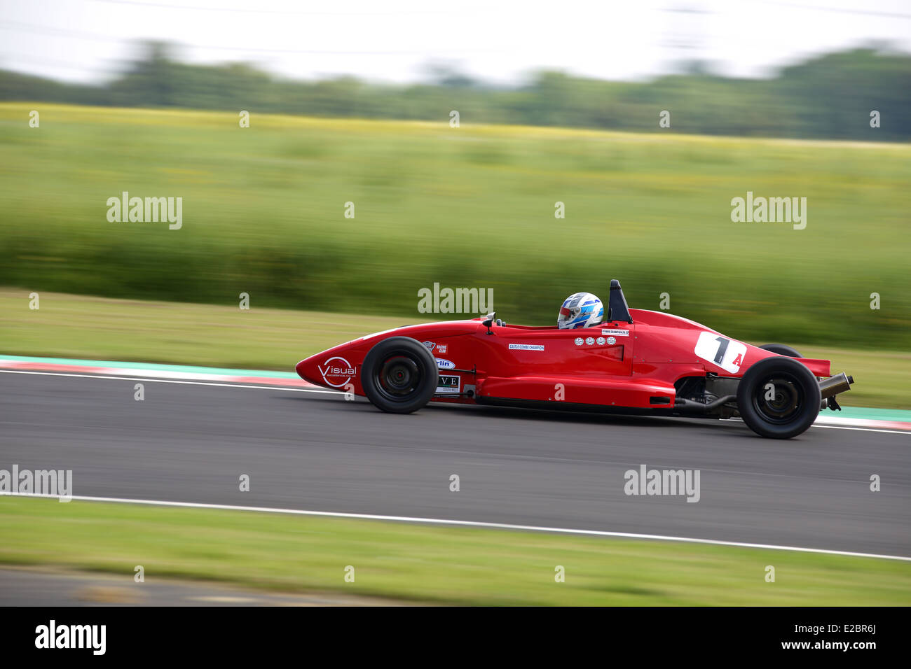 Cars racing at Castle Combe Circuit Stock Photo - Alamy