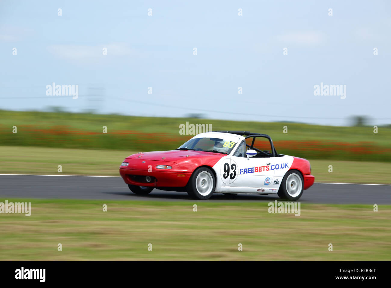 Cars racing at Castle Combe Circuit Stock Photo - Alamy